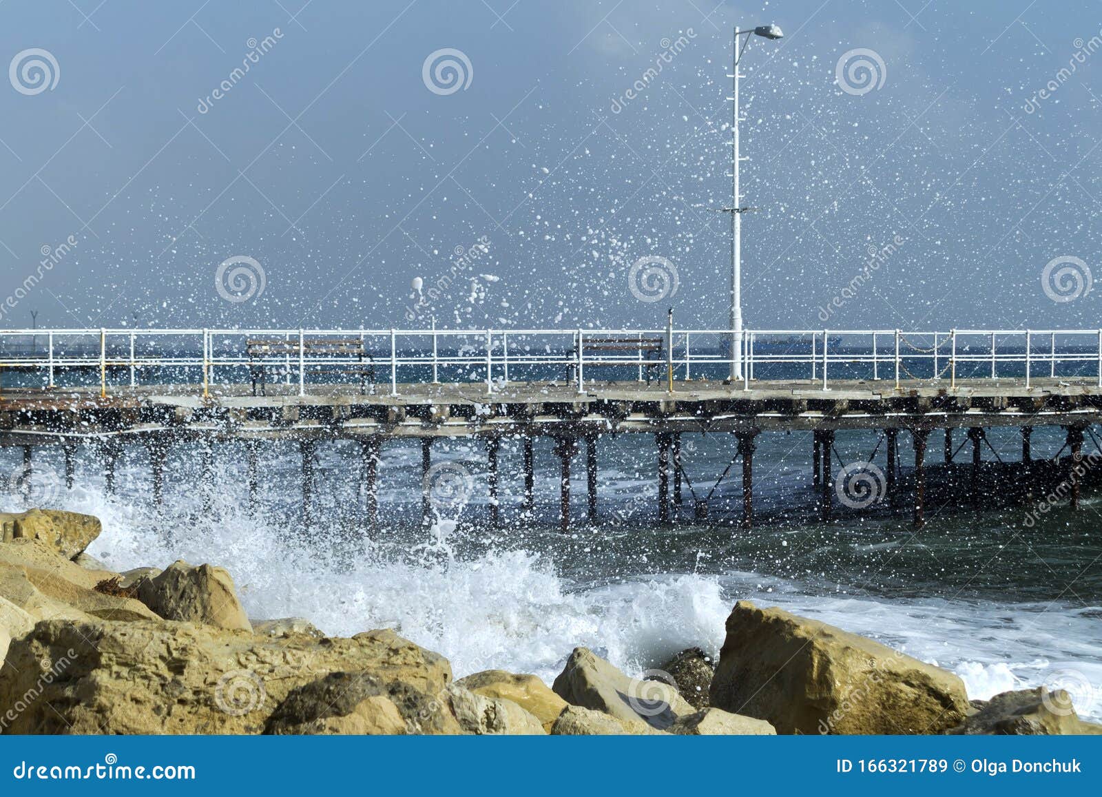 Sea wave splash on rocks stock image. Image of spray - 166321789