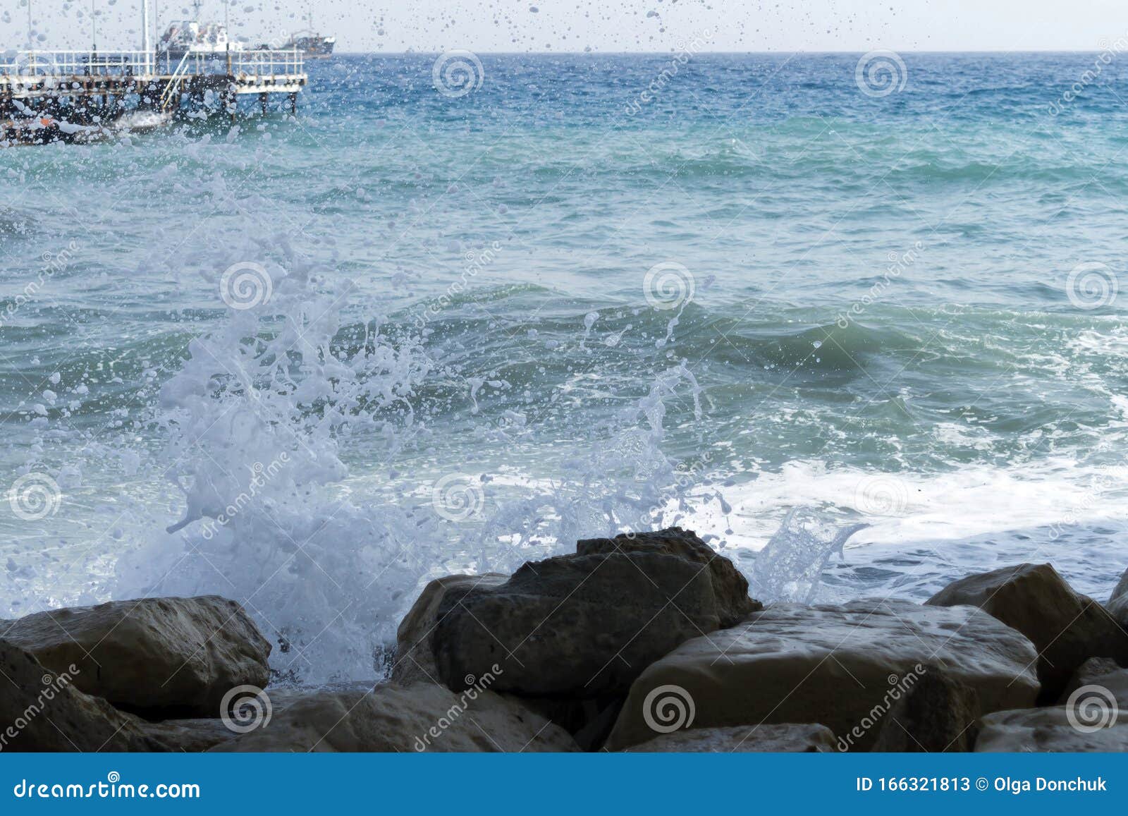 Sea wave splash on rocks stock image. Image of background - 166321813