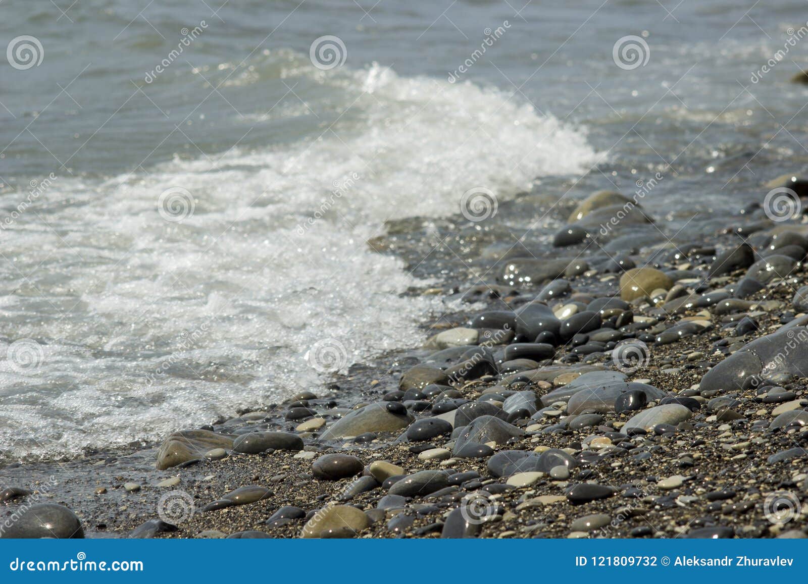 Sea wave on a stone beach stock photo. Image of aqualung - 121809732