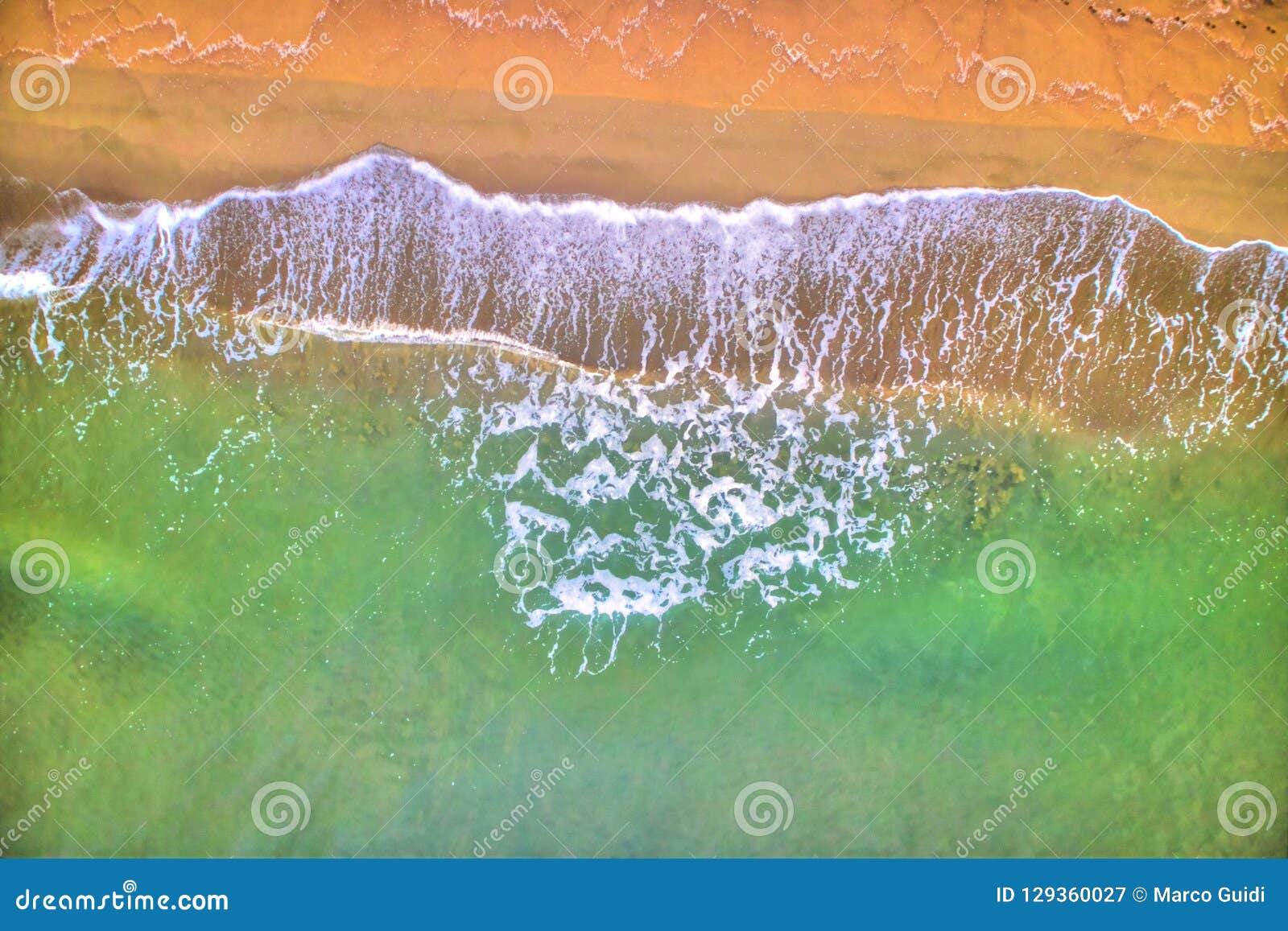 Sea waves on the beach stock image. Image of nature - 129360027