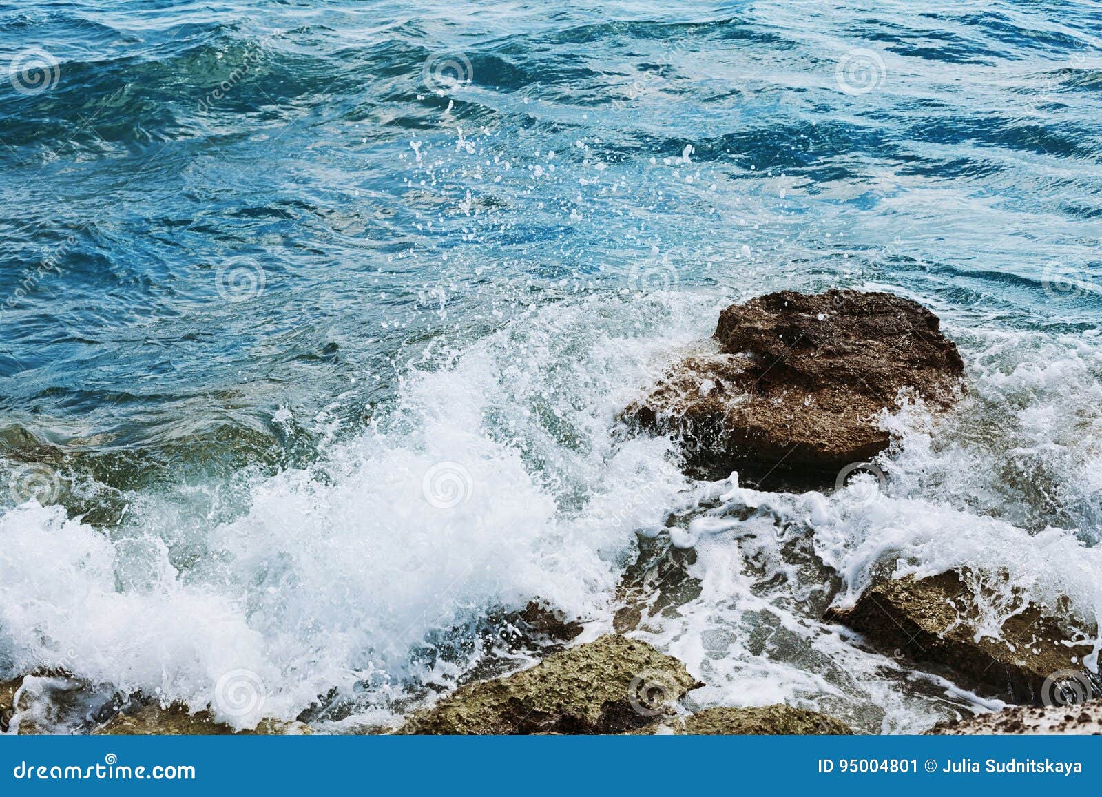 Sea Waves Crashing with Splash by the Stone Rocks in Windy Day. Stock ...