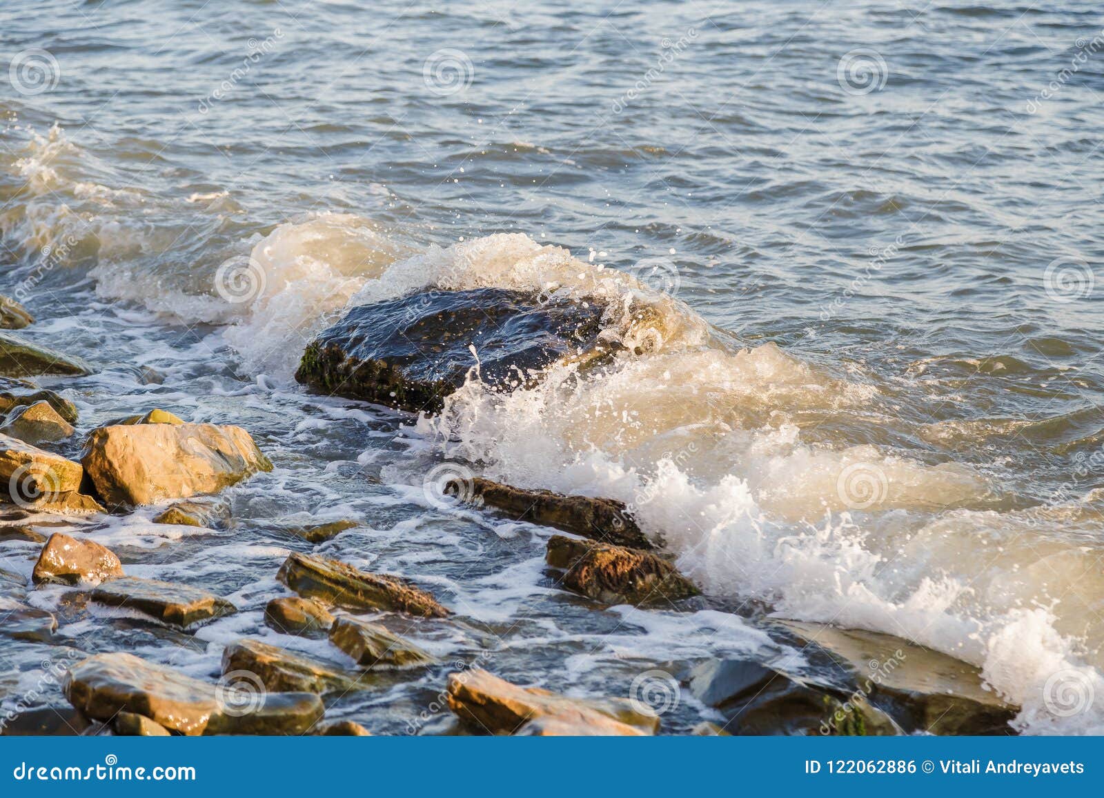 Sea Waves are Fighting Against the Big Rocks on the Shore. Stock Photo ...