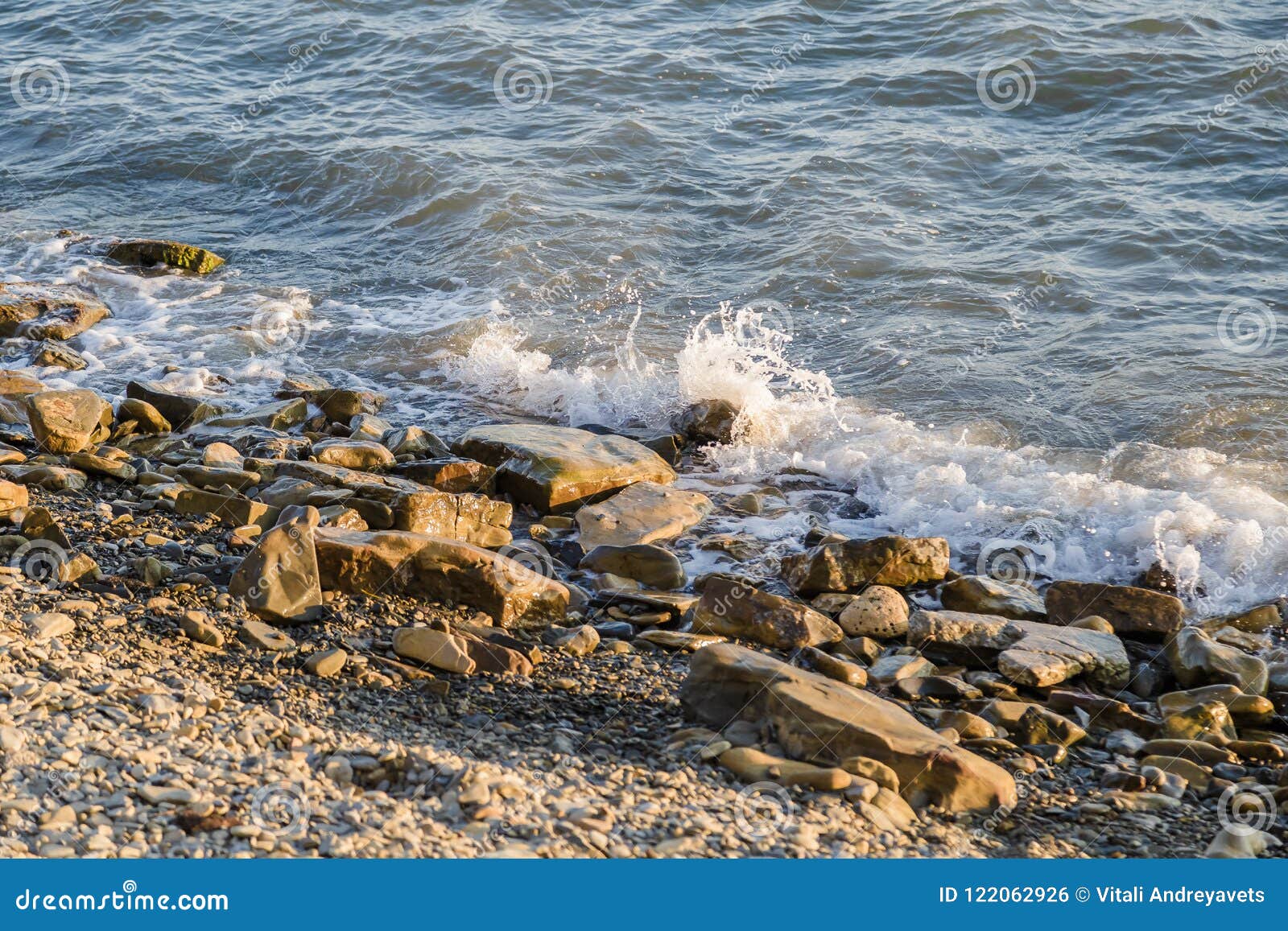 Sea Waves are Fighting Against the Big Rocks on the Shore. Stock Photo ...