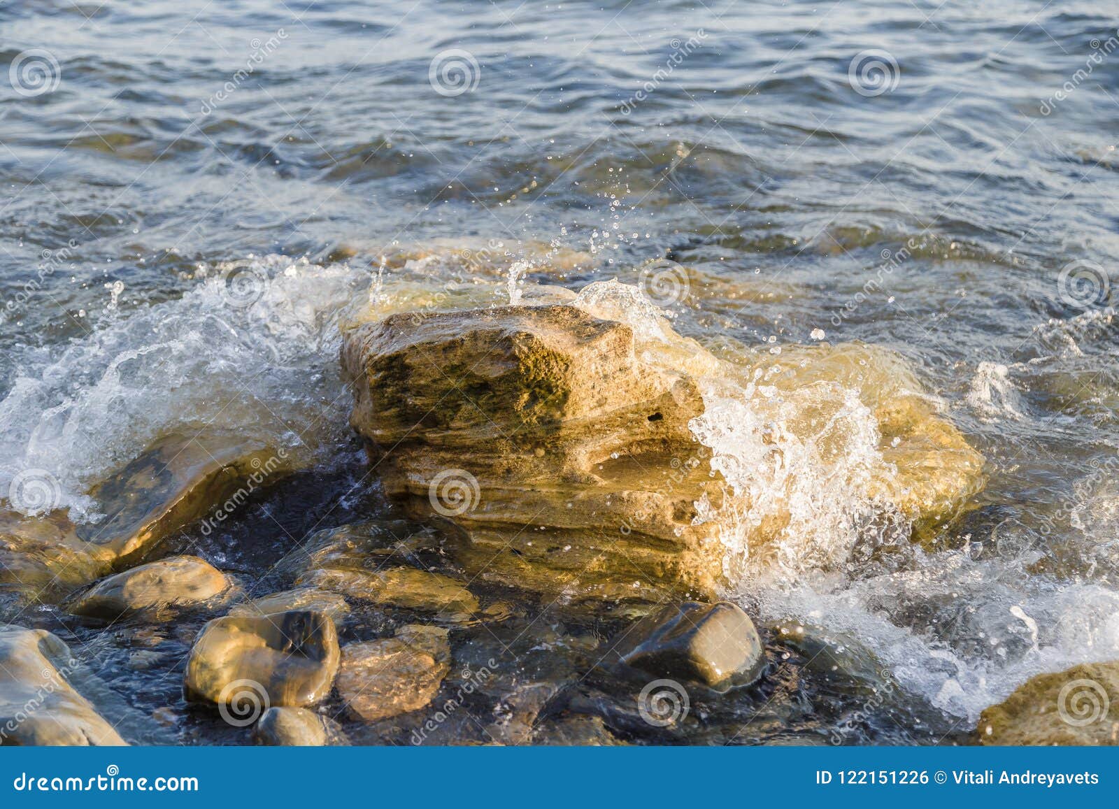 Sea Waves are Fighting Against the Big Rocks on the Shore. Stock Photo ...