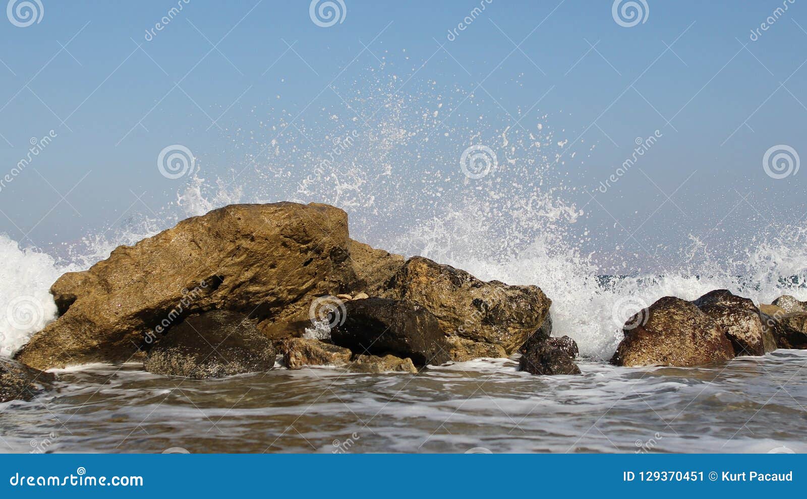 Sea Waves Hitting Rocks stock image. Image of coast - 129370451