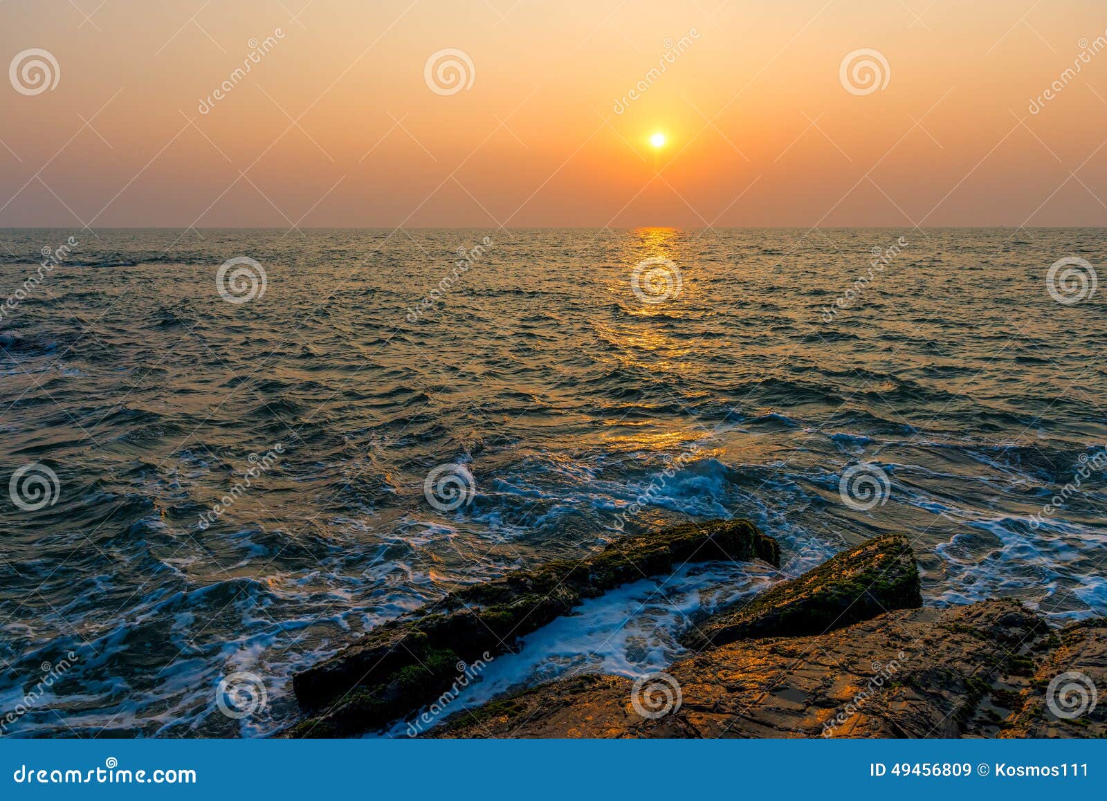 Sea waves and orange sky stock image. Image of light - 49456809