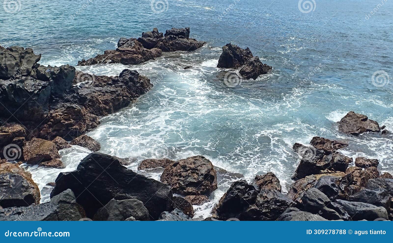 Sea waves and rock cluster stock photo. Image of rock - 309278788