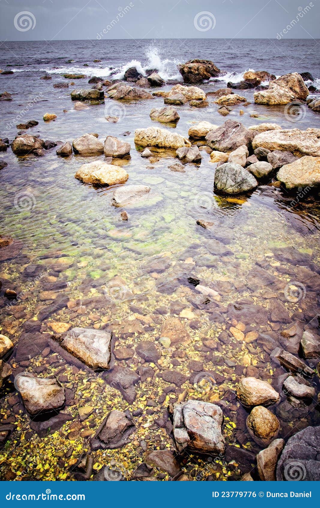 Sea waves and rocks stock photo. Image of picturesque - 23779776