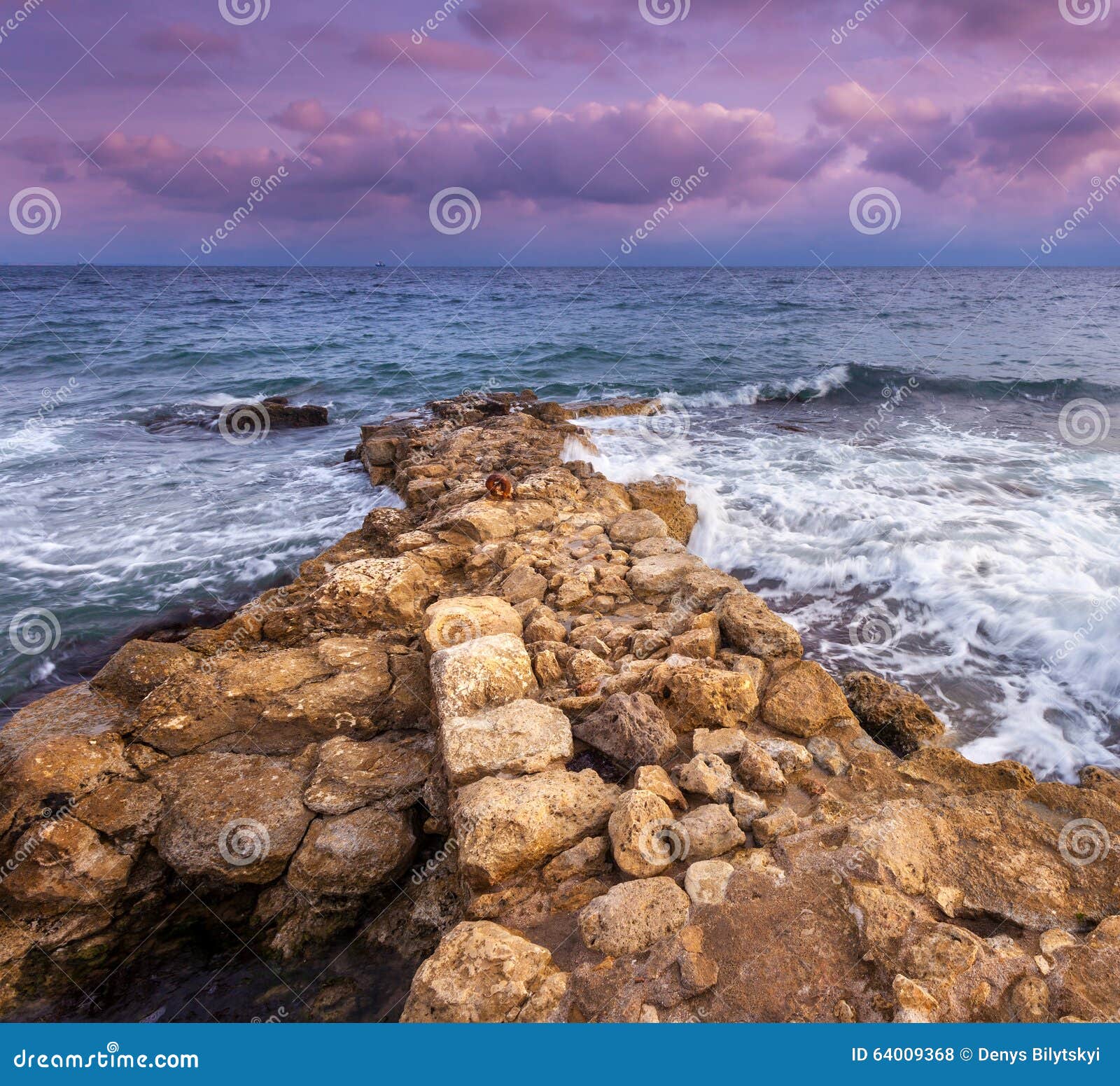 Sea Waves with Rocks on the Beach at Sunset Stock Photo - Image of rock ...