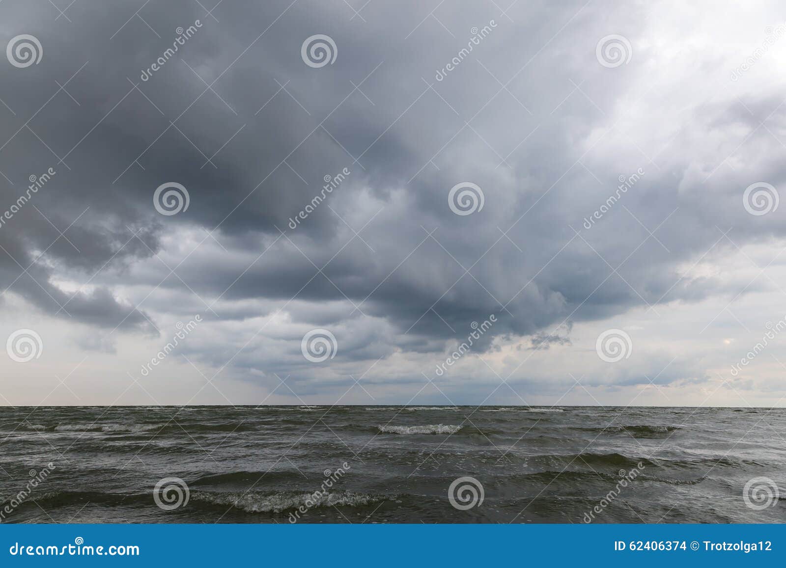 Sea Waves on a Sandy Beach with Stormy Sky Stock Photo - Image of ...