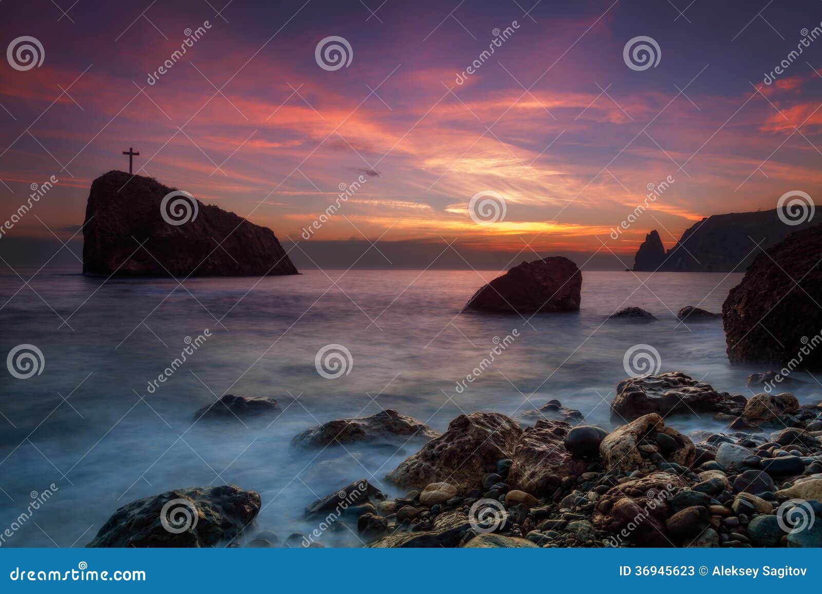 Seacoast at Sunset and a Cross on a Rock Stock Image - Image of beach ...