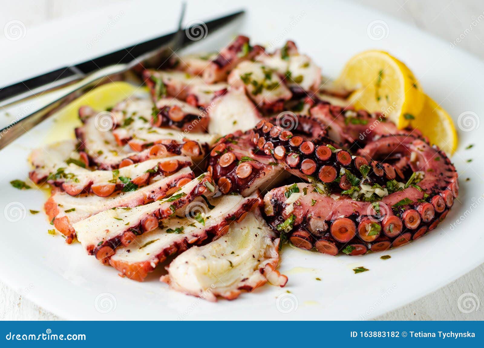 Seafood Appetizer. Octopus Carpaccio on White Plate. Mediterranean ...
