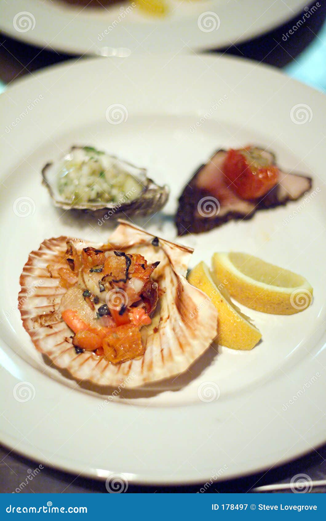 Seafood Entrée stock image. Image of restaurant, food, lemon - 178497