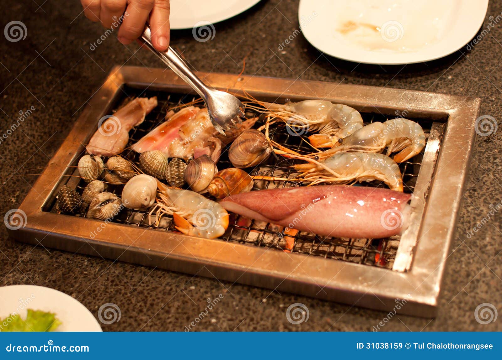Seafood on the grill stock image. Image of shell, nutrition - 31038159
