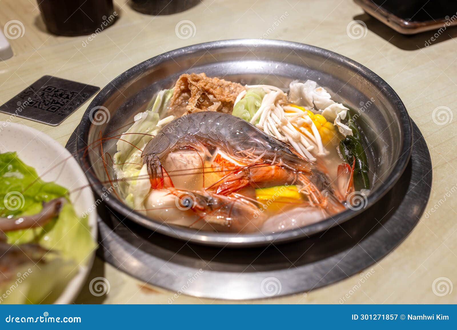 Seafood in a Hot Pot on the Table in a Restaurant Stock Image - Image ...