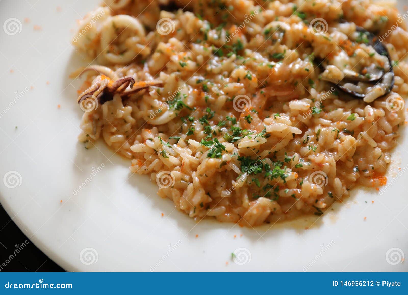Seafood Risotto , Traditional Italian Rice on Table Stock Photo - Image ...