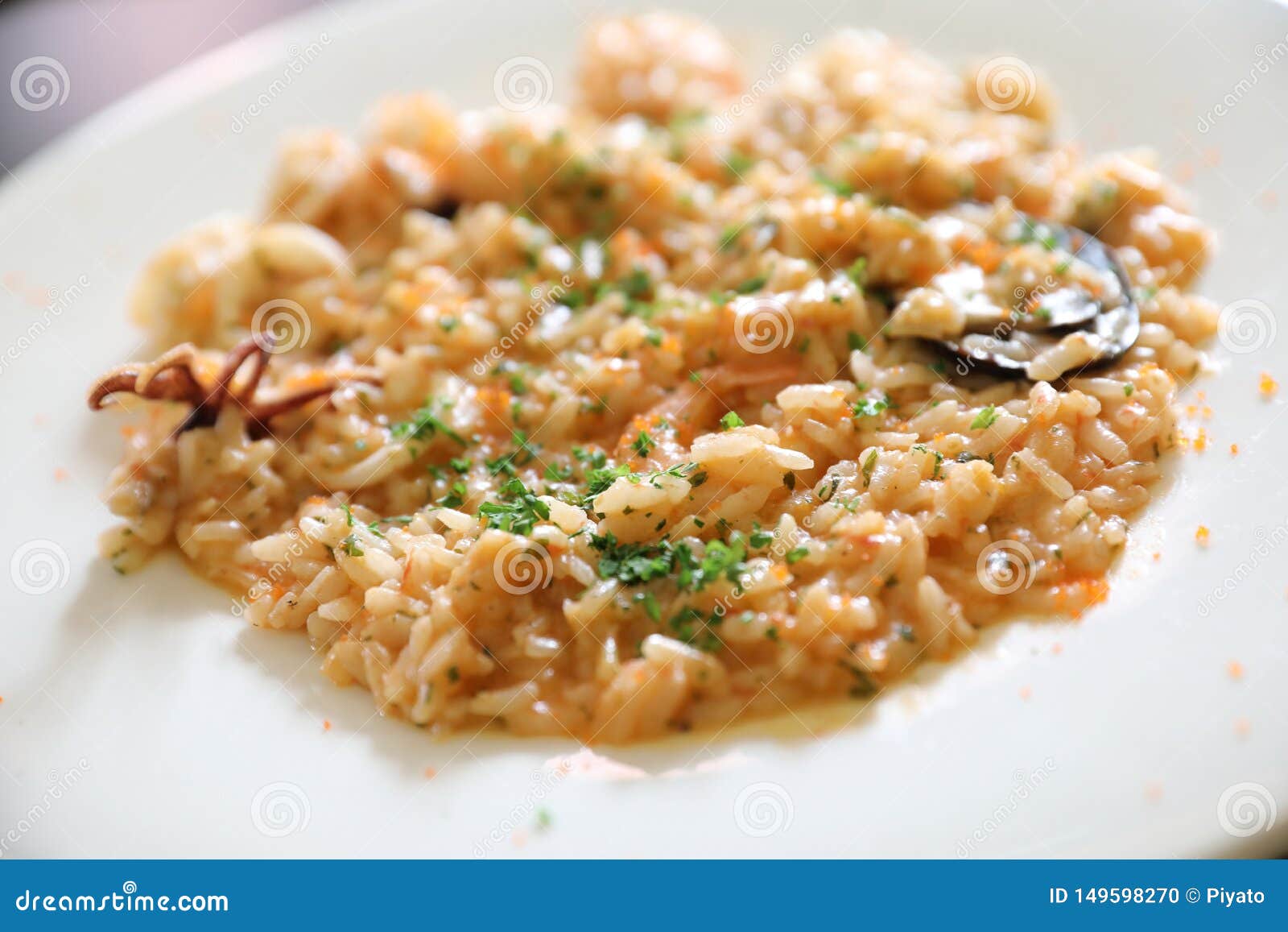 Seafood Risotto , Traditional Italian Rice on Table Stock Photo - Image ...