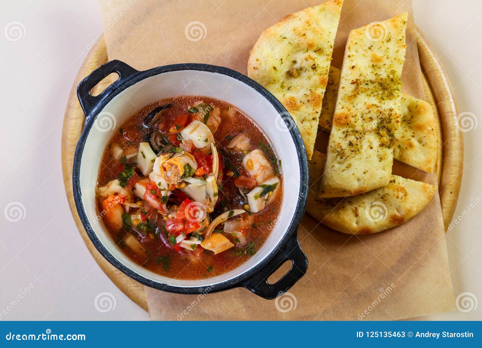 Seafood suop with bread stock image. Image of lemon - 125135463