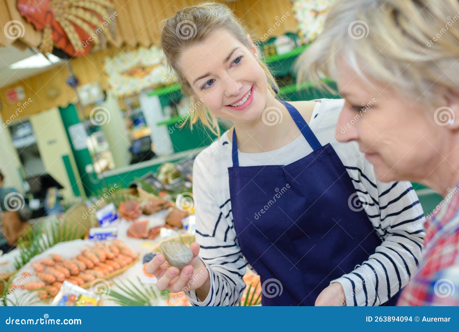Seafood Vendor Presenting Shell To Customer Stock Photo - Image of open ...