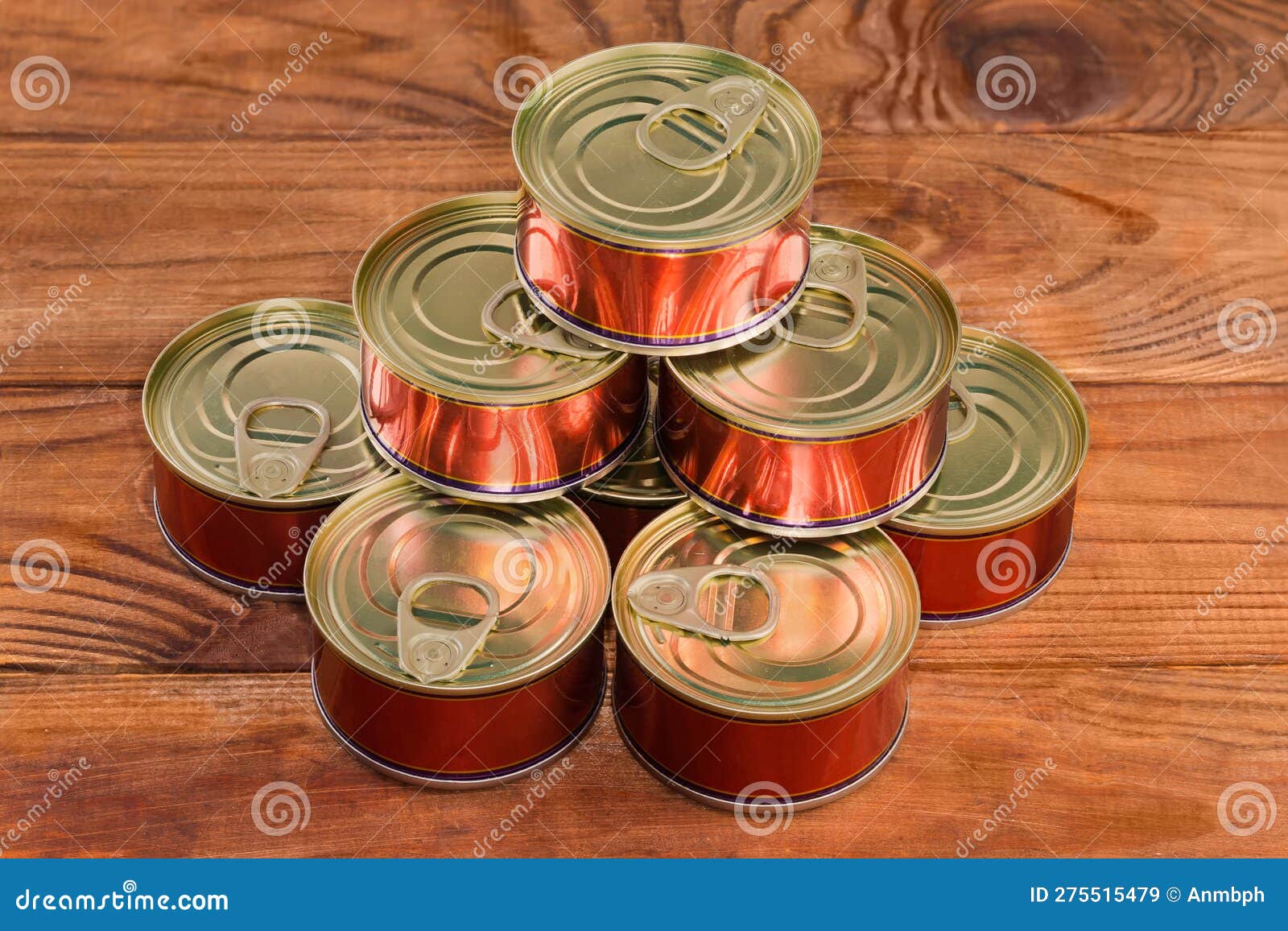 Sealed Tin Cans of Canned Fish on a Rustic Table Stock Image - Image of ...