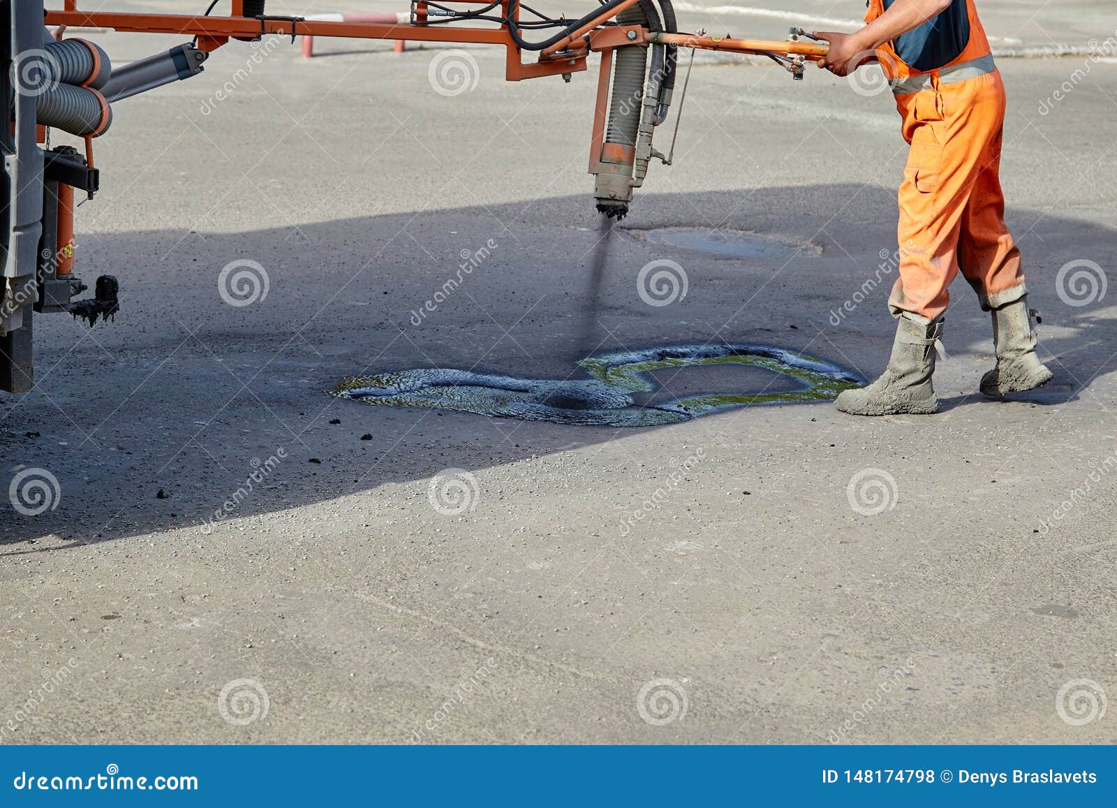 Sealing of Asphalt Pits by Blowing Hot Mixture Stock Photo - Image of ...