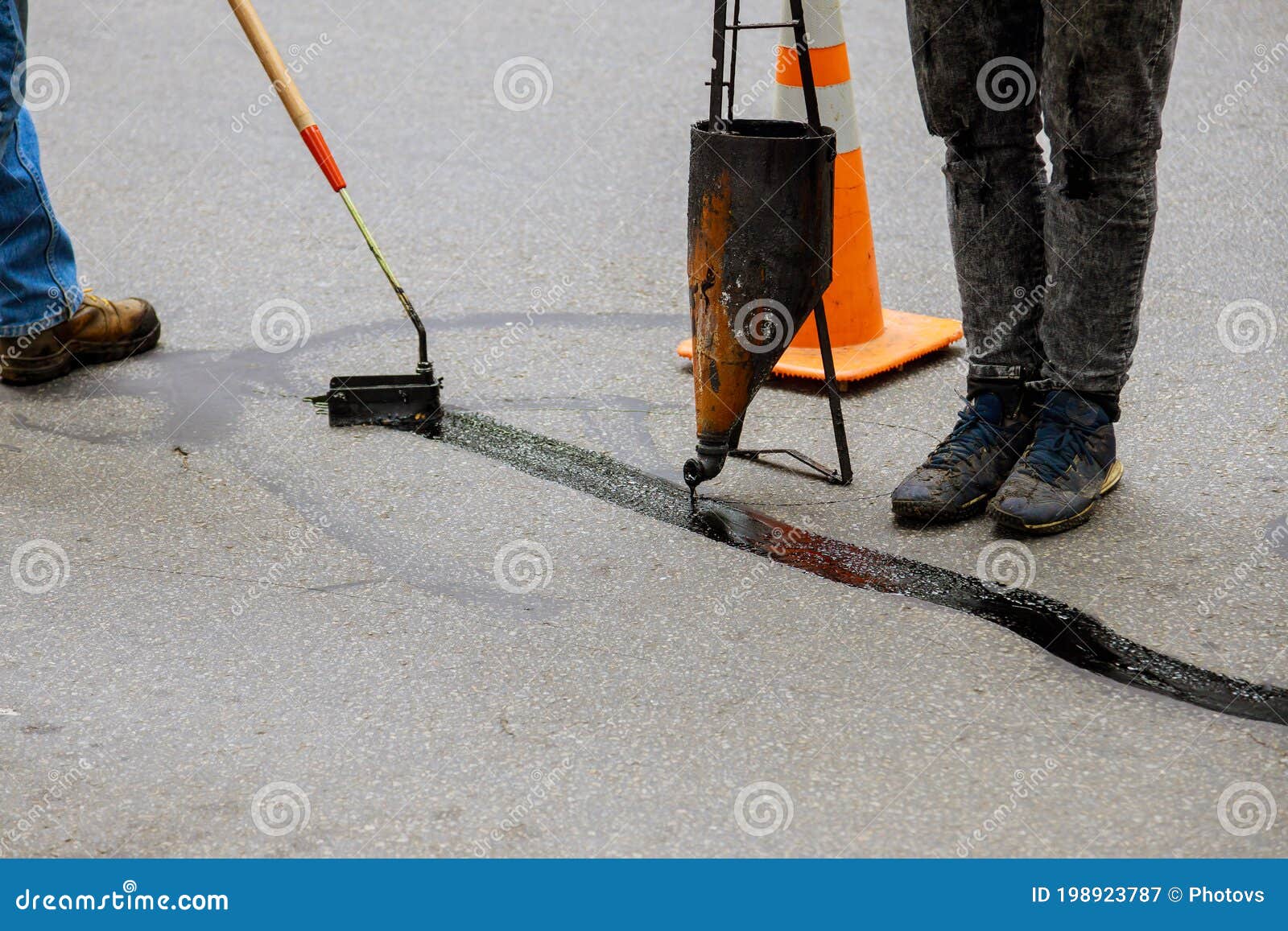 Sealing Joint Crack in Asphalt Road Surface Restoration Work Stock ...