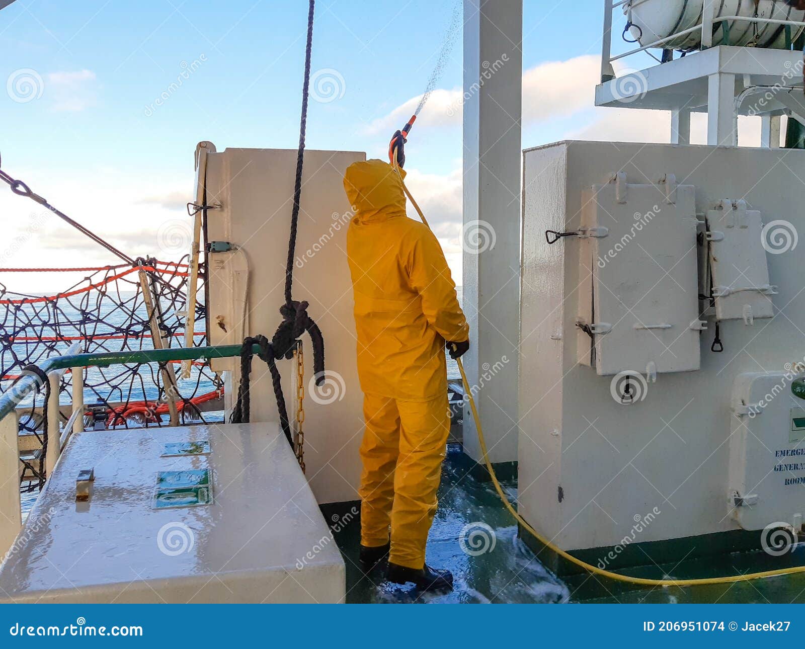 Seaman cleaning the ship. stock photo. Image of high - 206951074