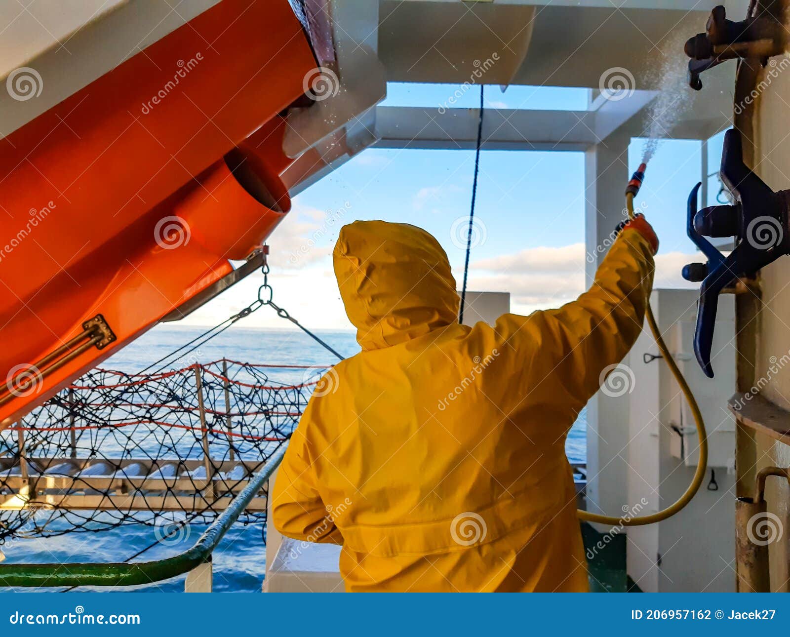 Seaman cleaning the ship. stock photo. Image of color - 206957162