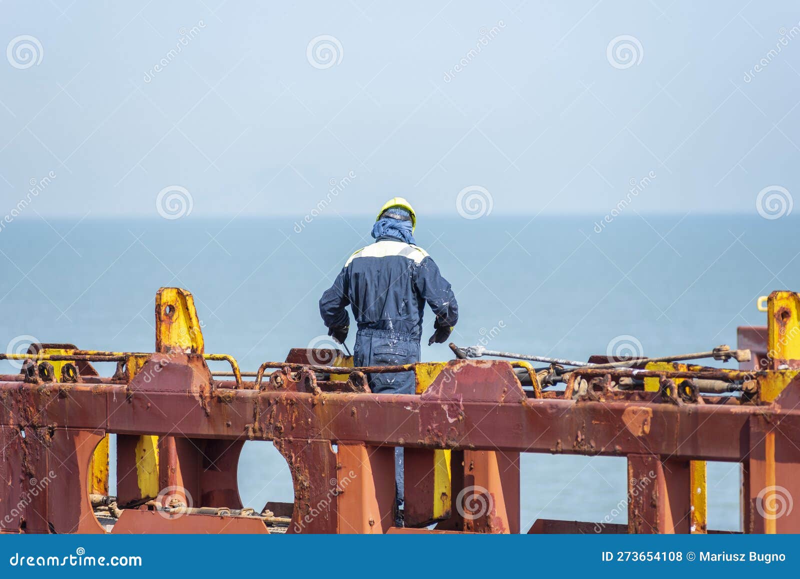Seaman Working on Deck of the Container Vessel. Stock Photo - Image of ...