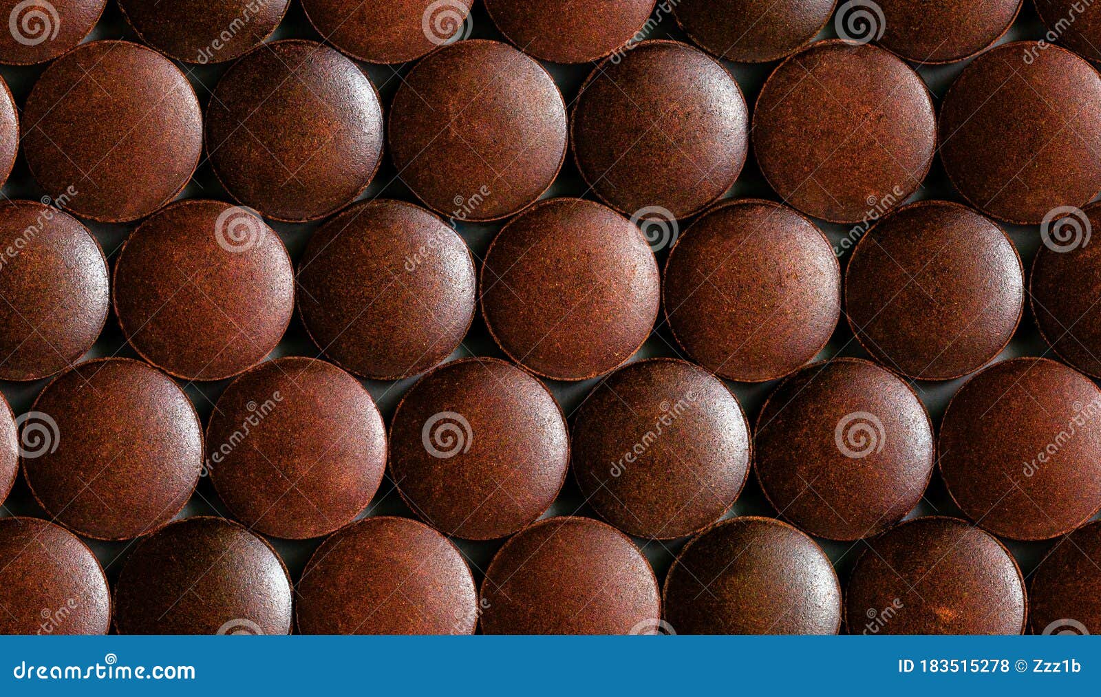 A Seamless Hexagonal Pattern of Many Brown Organic Powder Tablets Laid ...