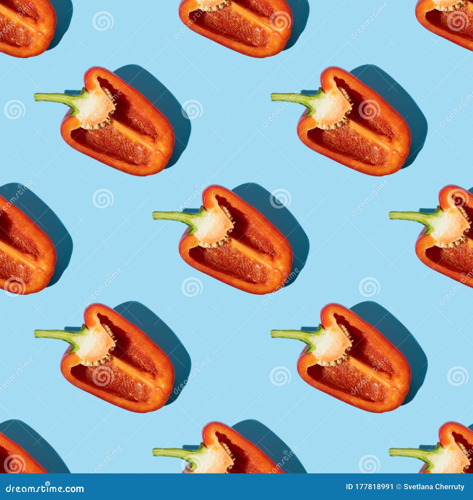 Seamless Pattern of Half Red Pepper on Blue Background Stock Image ...