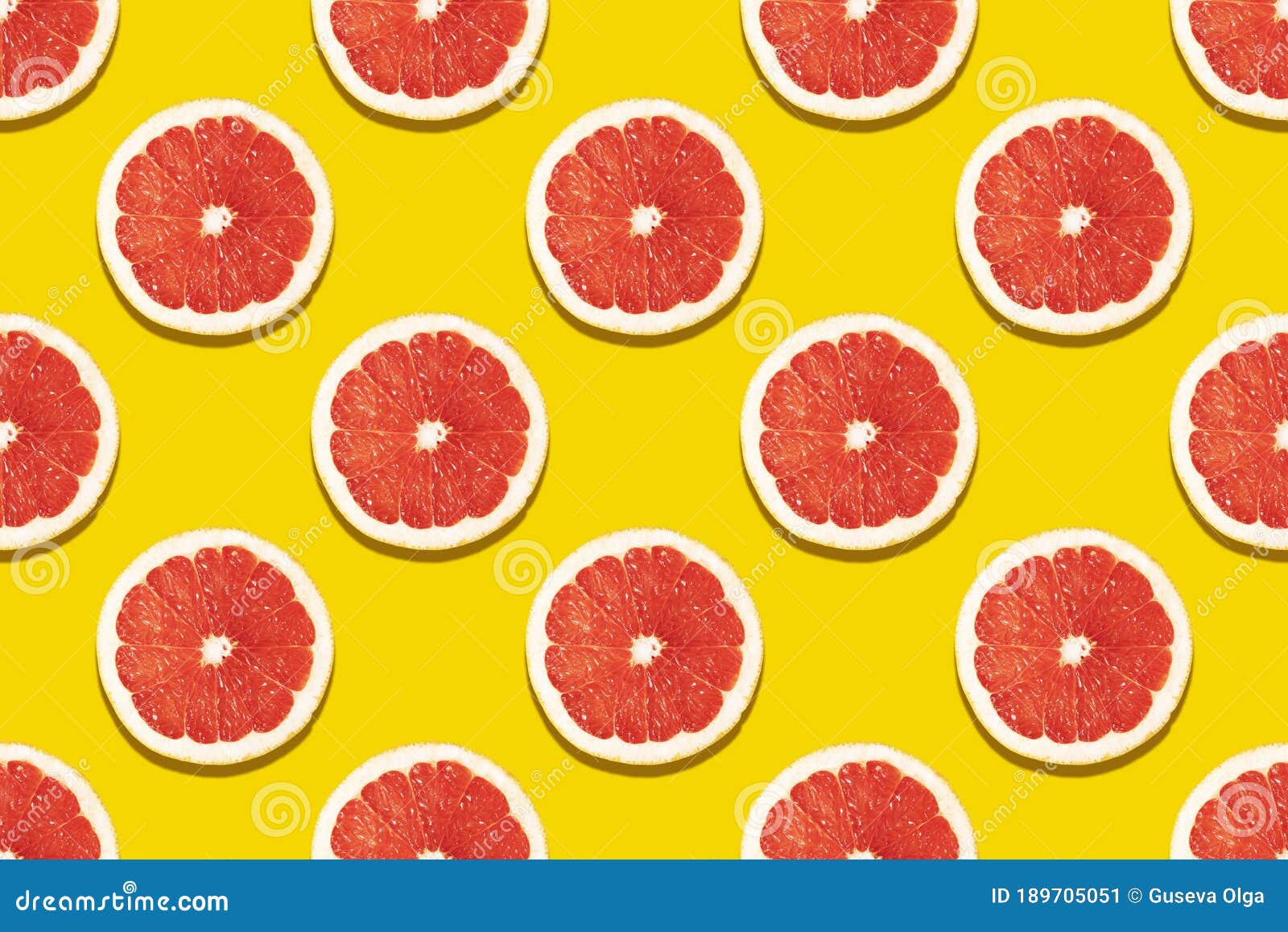 Seamless Pattern with a Slice of Grapefruit on a Yellow Background ...