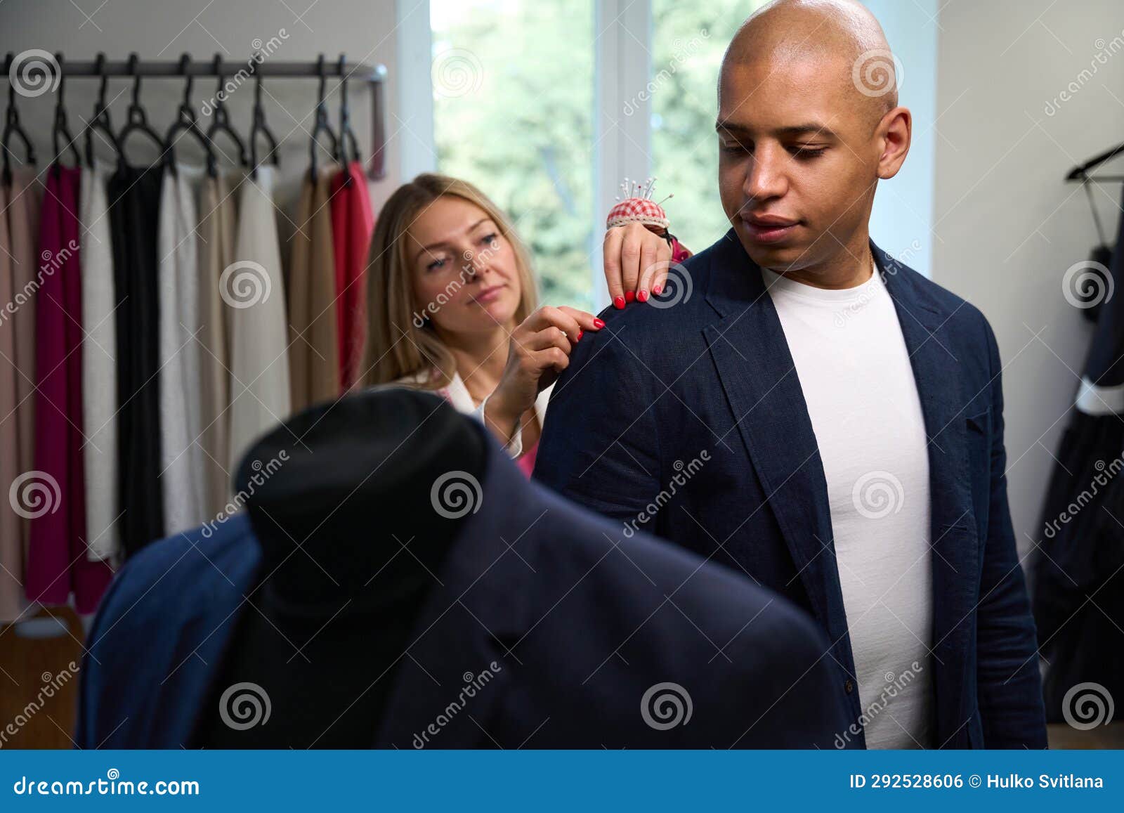 Seamstress Adjusting Shoulder Width of Customer Clothing Stock Photo ...