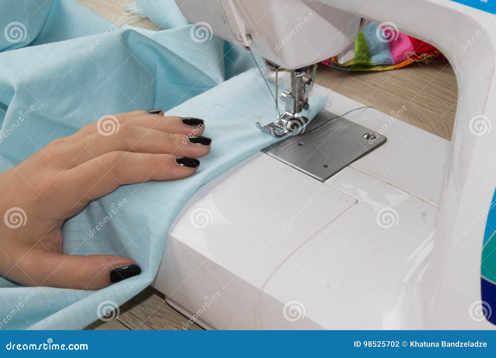 Seamstress Female Sews Clothes and Put Thread in Needle. Workplace of ...