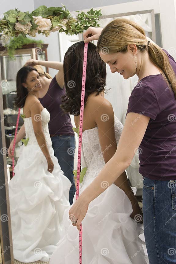 Seamstress Measuring Bride. Stock Image - Image of women, female: 2542915