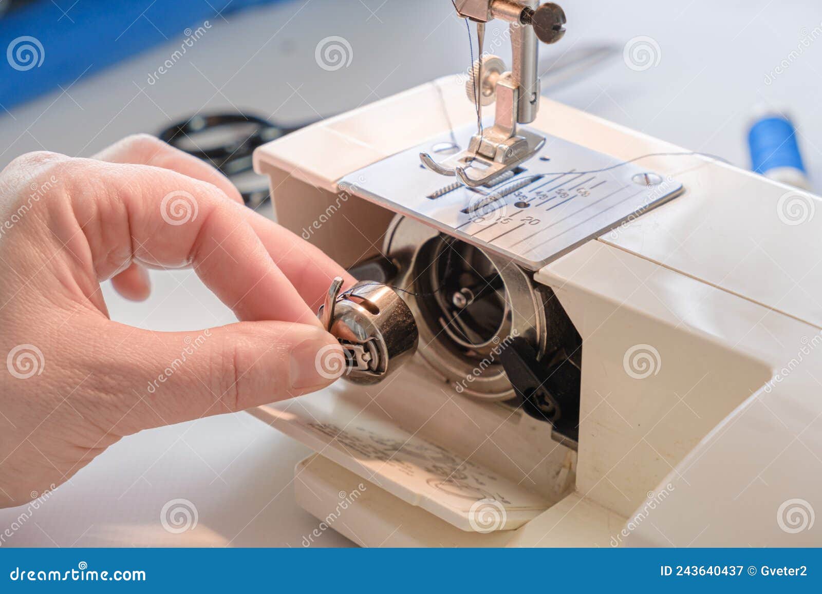 Seamstress Pulling Bobbin of an Electric Sewing Machine Stock Image ...