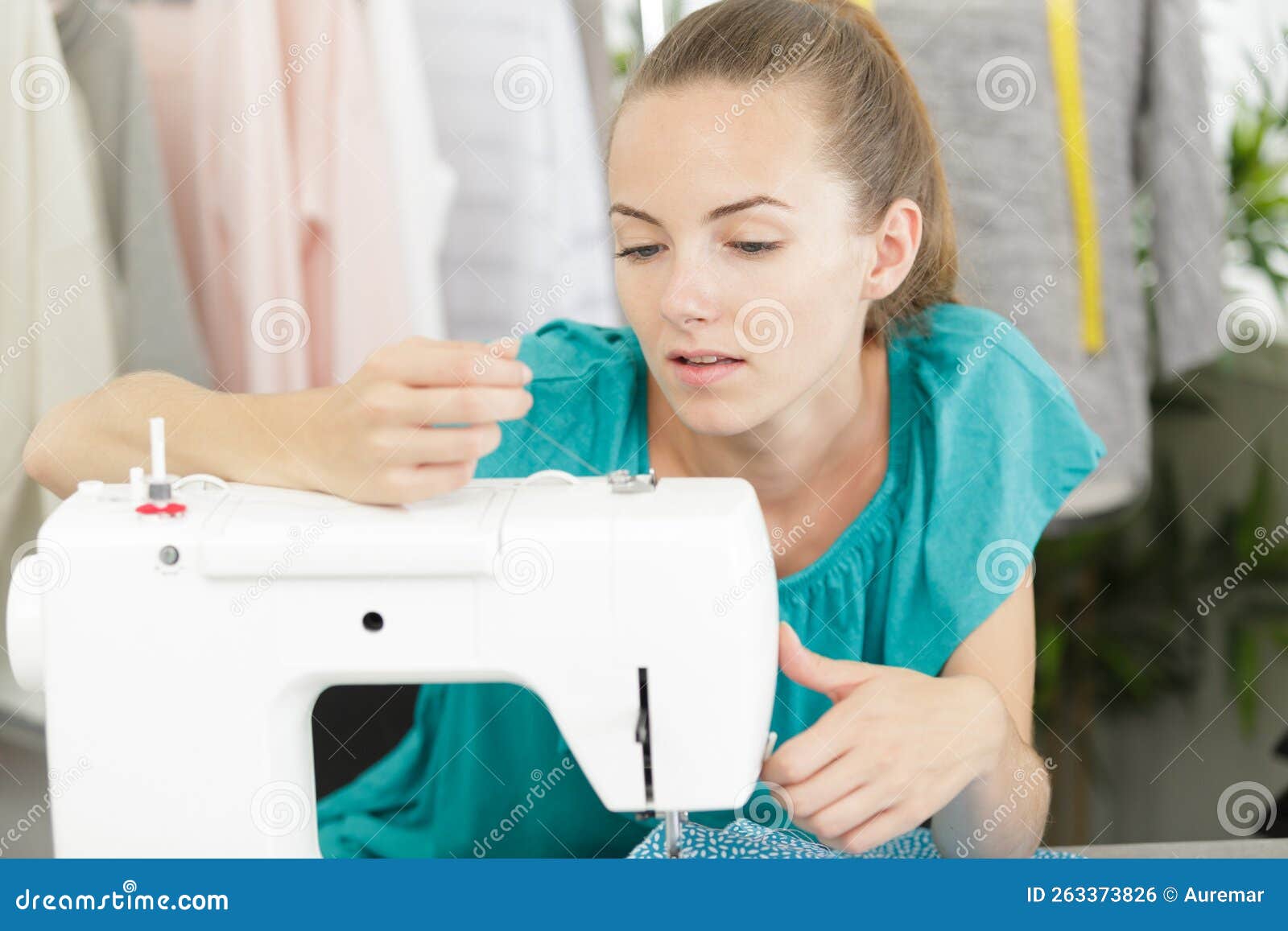 Seamstress Tuning Sewing Machine for Work Stock Photo - Image of ...