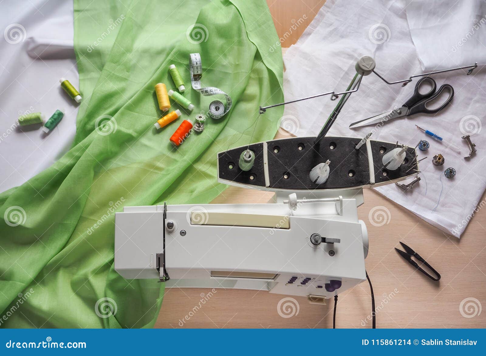 Seamstress Works on a Sewing Machine. Stages of the Production Cycle on ...