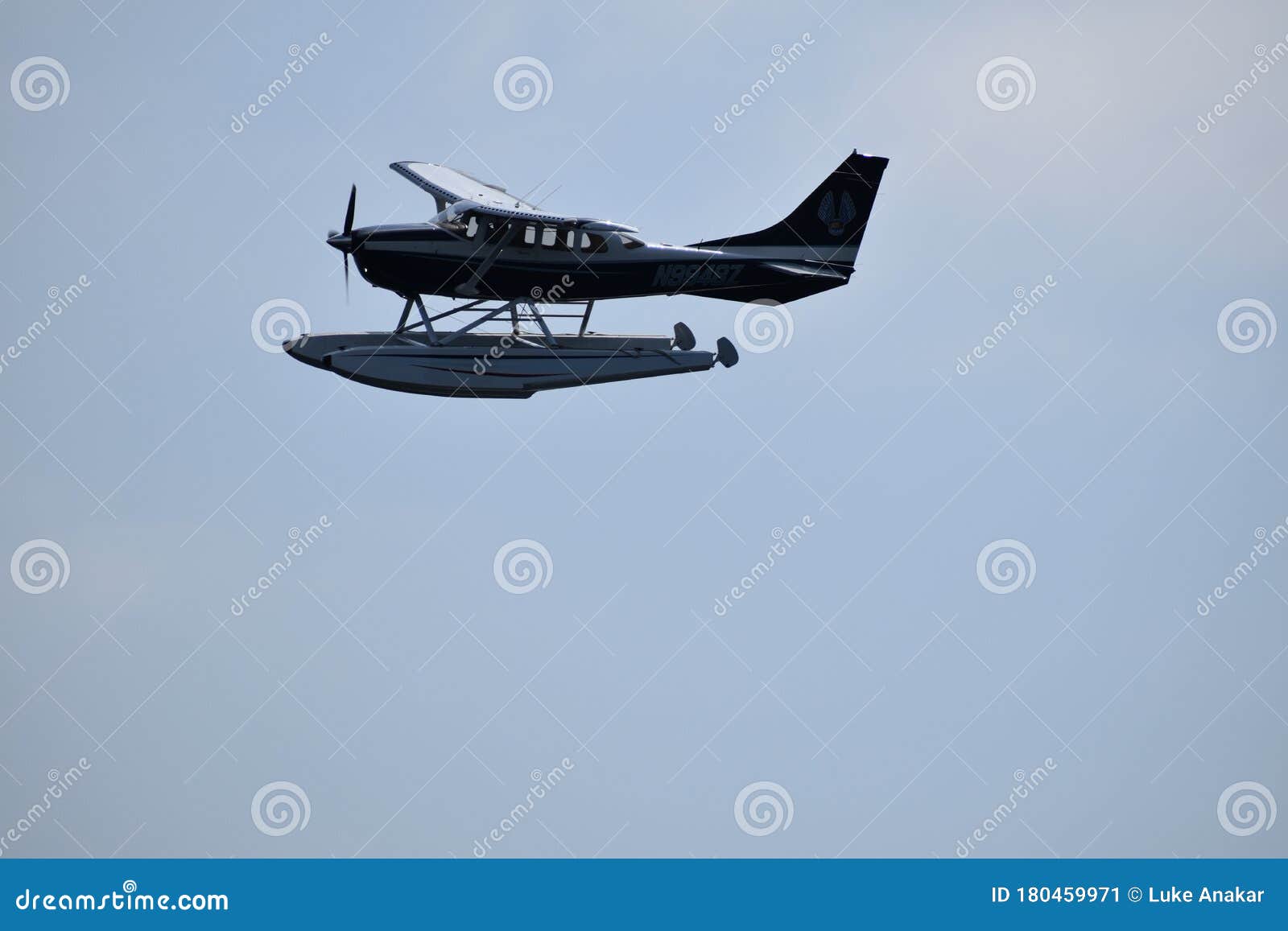 A Seaplane Flying Low editorial photo. Image of seaplane - 180459971