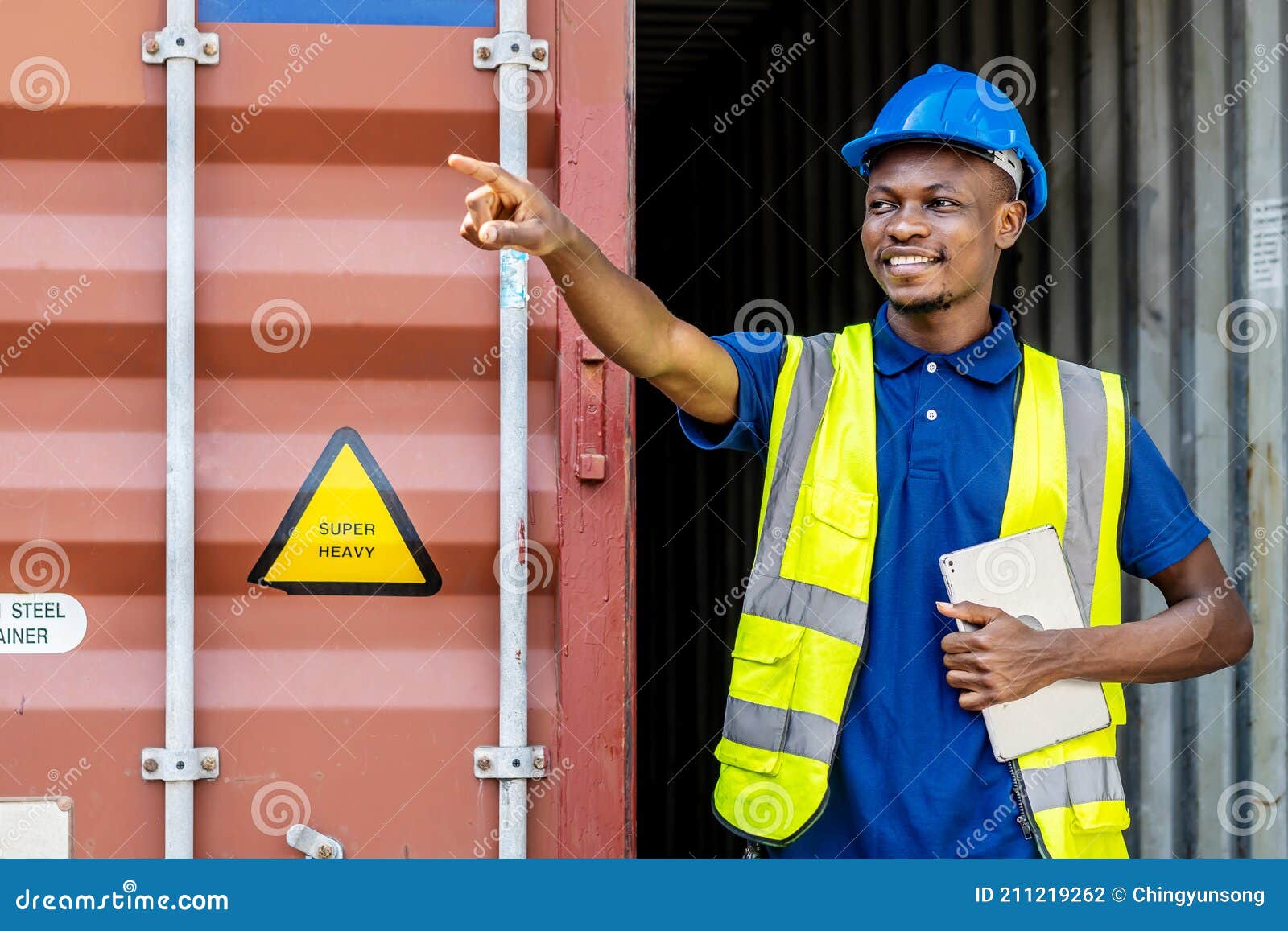 Seaport Inspector Busy with in-checking on Cargo and Pointing To ...