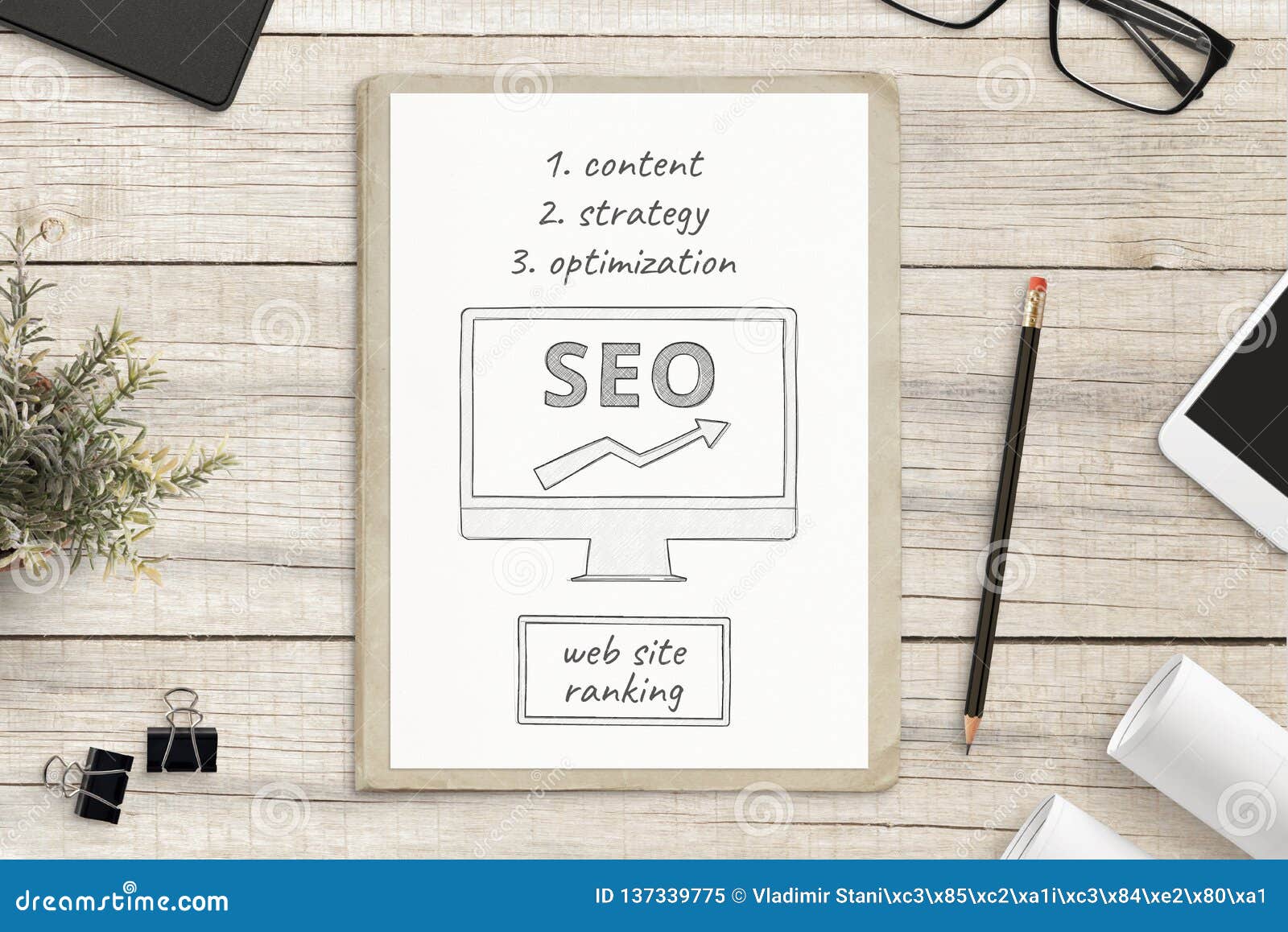 Search Engine Optimization Sketch on White Paper Surrounded with Office ...