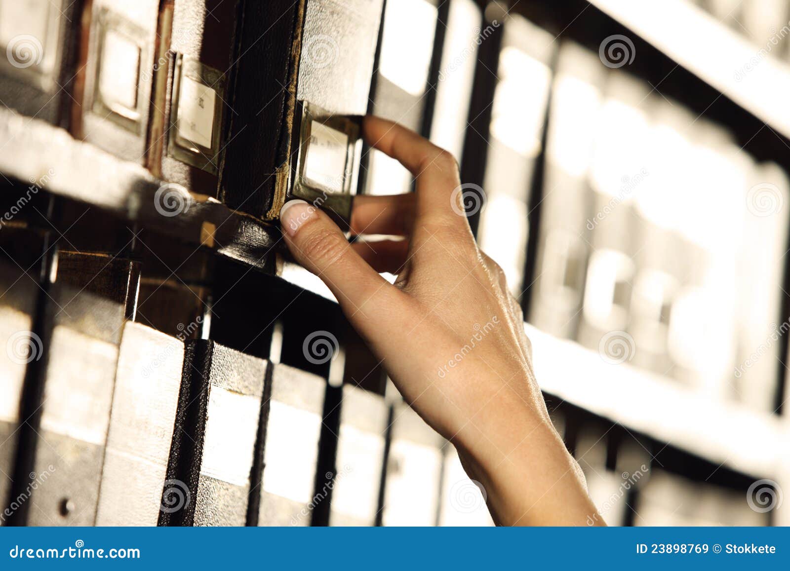 Searching in archives. stock image. Image of education - 23898769