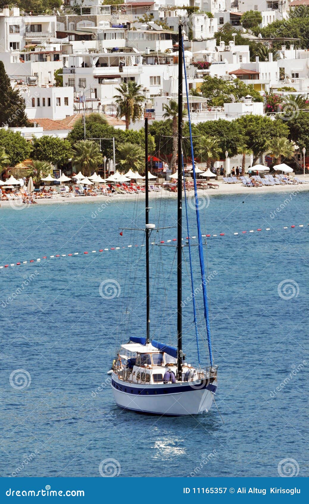 Seascape with Anchored Sailboat Off the Beach Stock Image - Image of ...