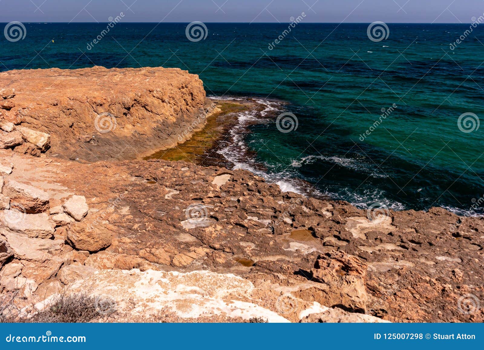 Seascape and cliffs stock photo. Image of blue, surf - 125007298