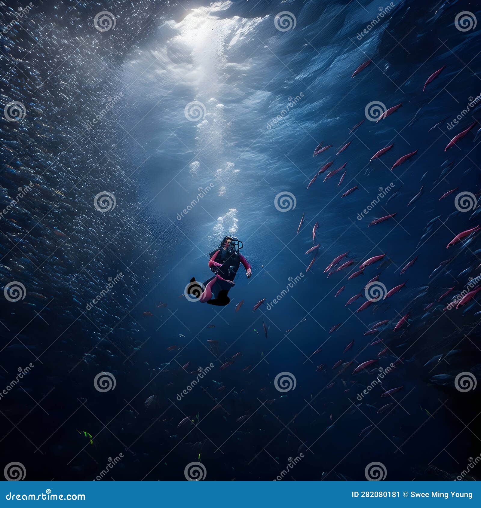 Seascape Image of Divers Swimming and Exploring the Depth of the Ocean ...