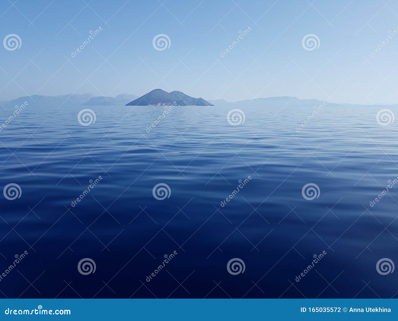 Seascape with an Island on the Horizon at Dawn Stock Photo - Image of ...