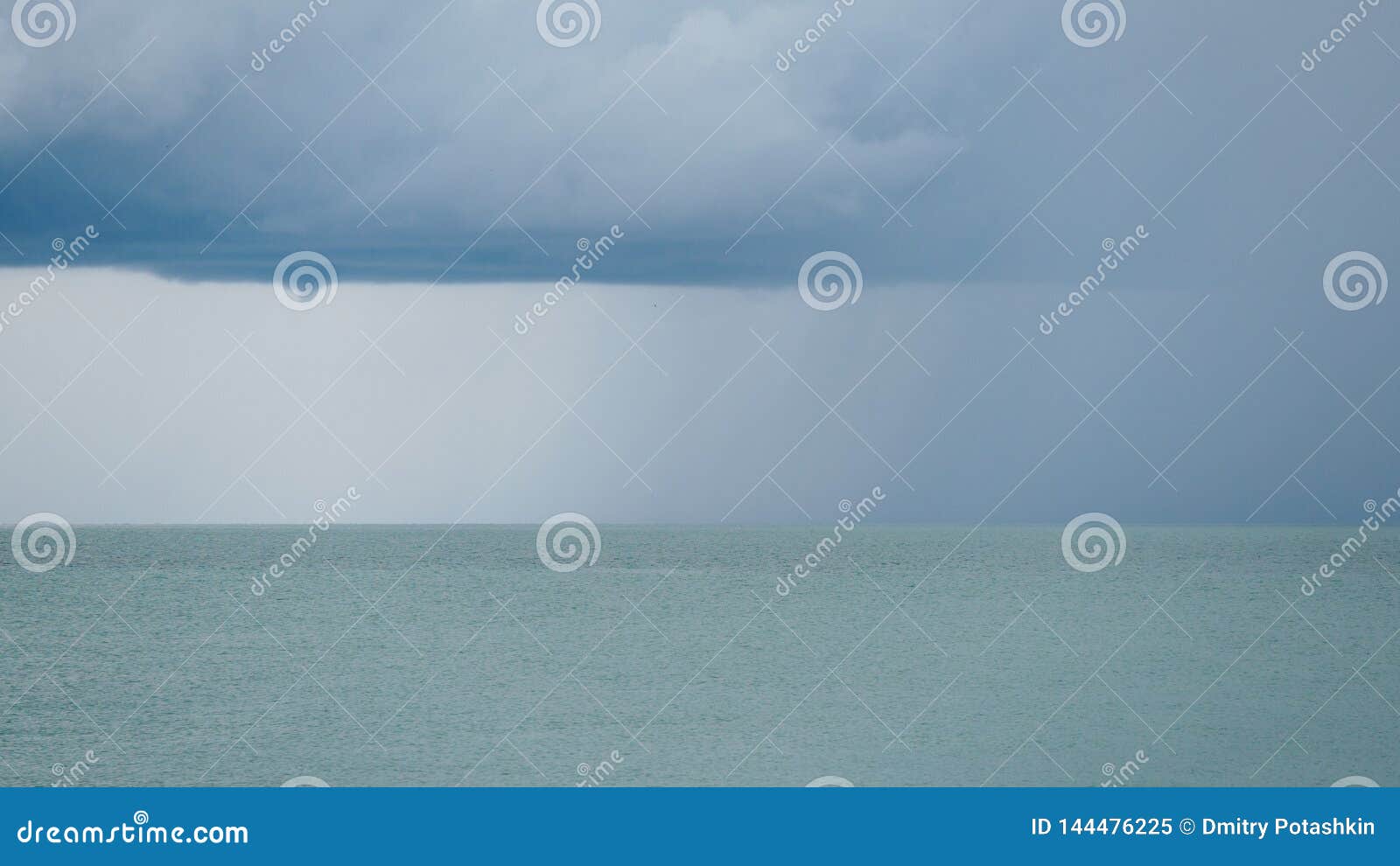 Seascape with Rain in the Distance Stock Image - Image of light ...