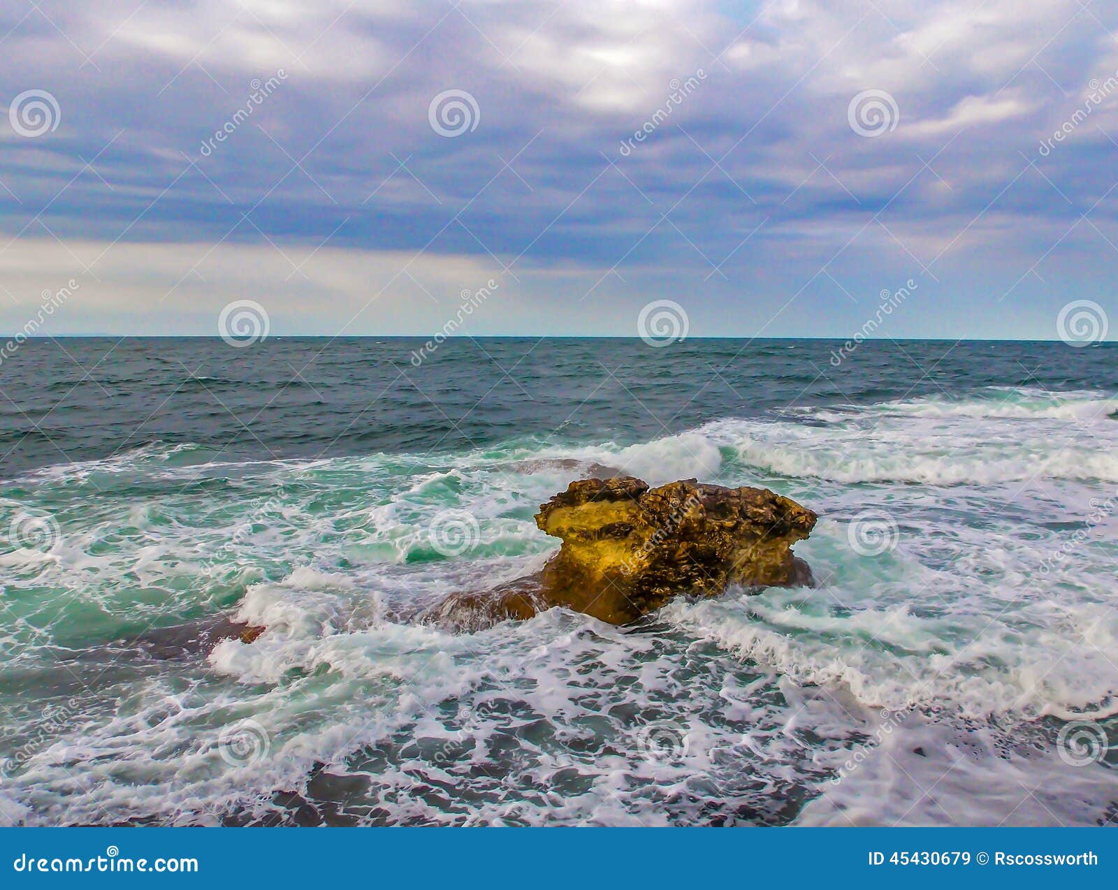Seascape and a rock stock image. Image of blue, clouds - 45430679