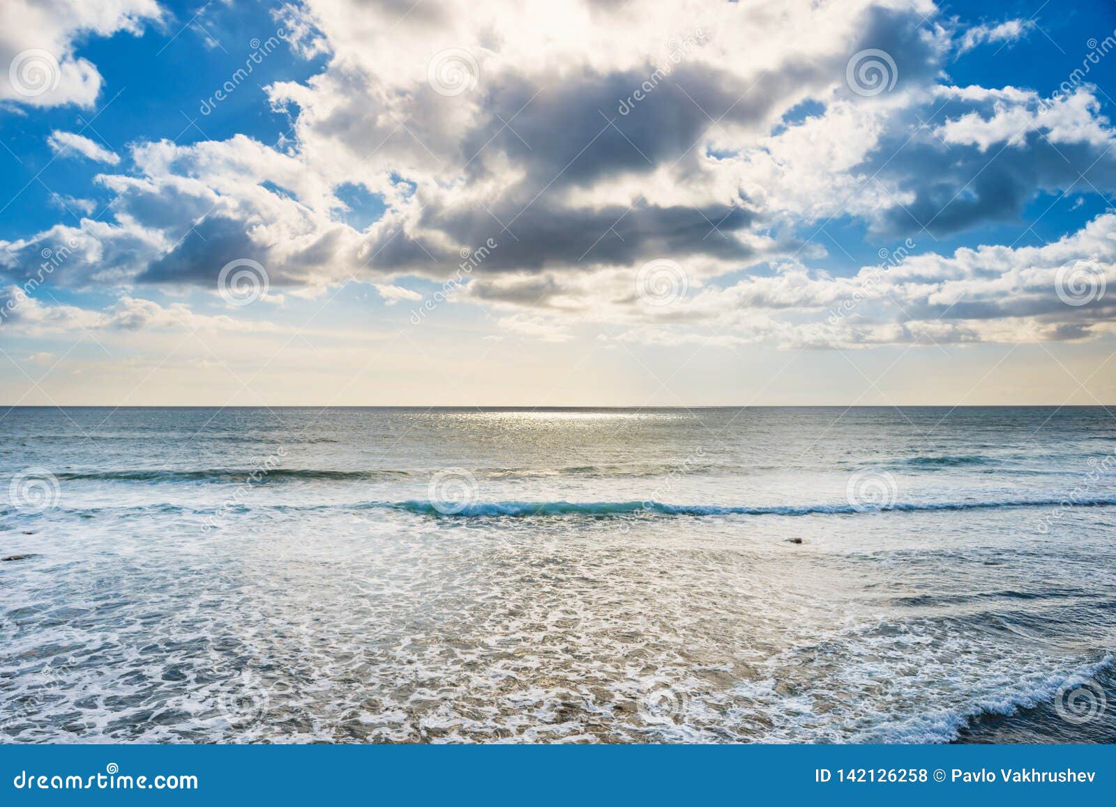 Seascape with Silver Sunlight Reflection, Sky and Clouds Stock Photo ...