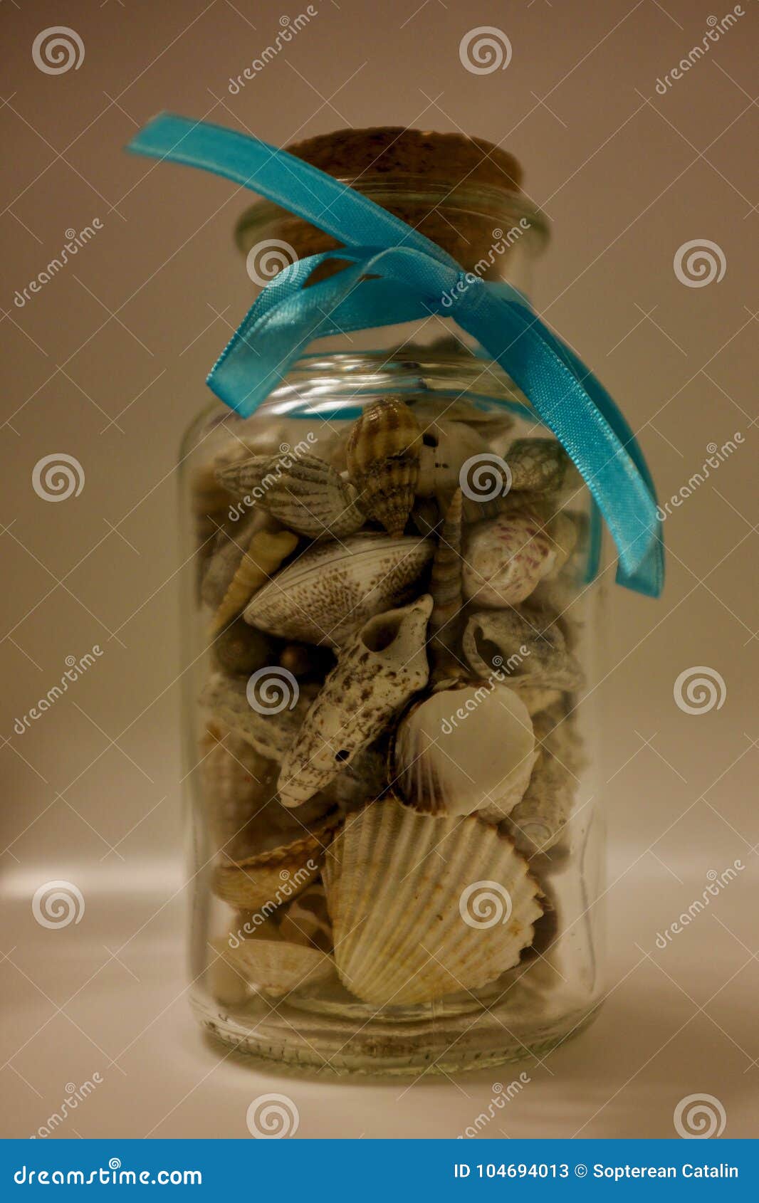 Seashells in a glass jar stock image. Image of decorations - 104694013